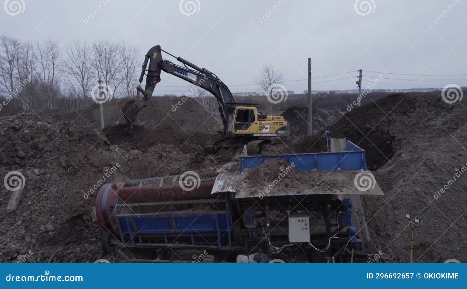 Employee Controls Soil Filtering Machine and Excavator Stock Video ...