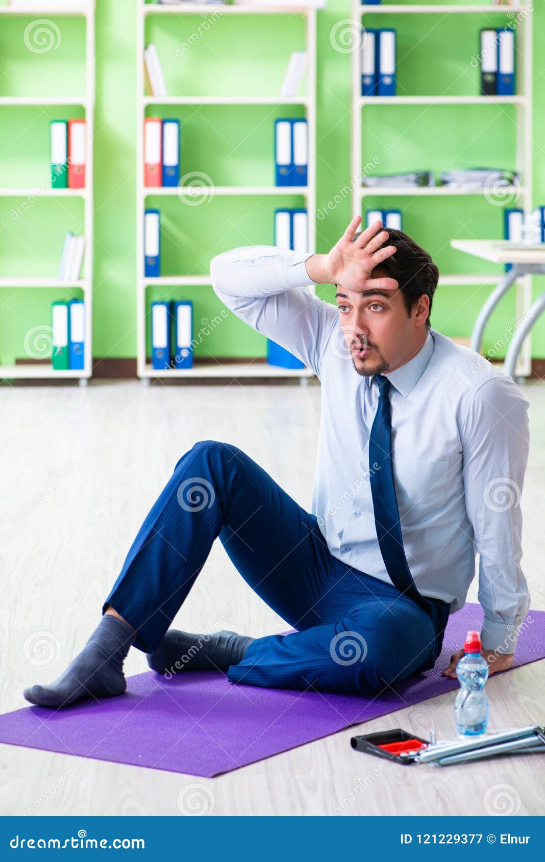 The Employee Doing Exercises during Break at Work Stock Image - Image ...