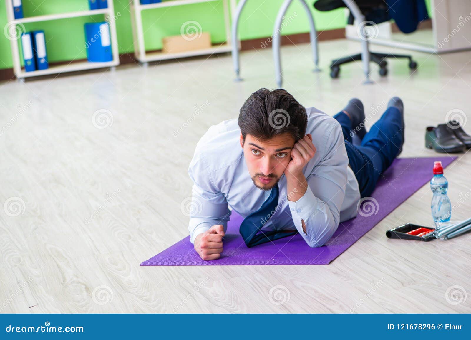 The Employee Doing Exercises during Break at Work Stock Photo - Image ...