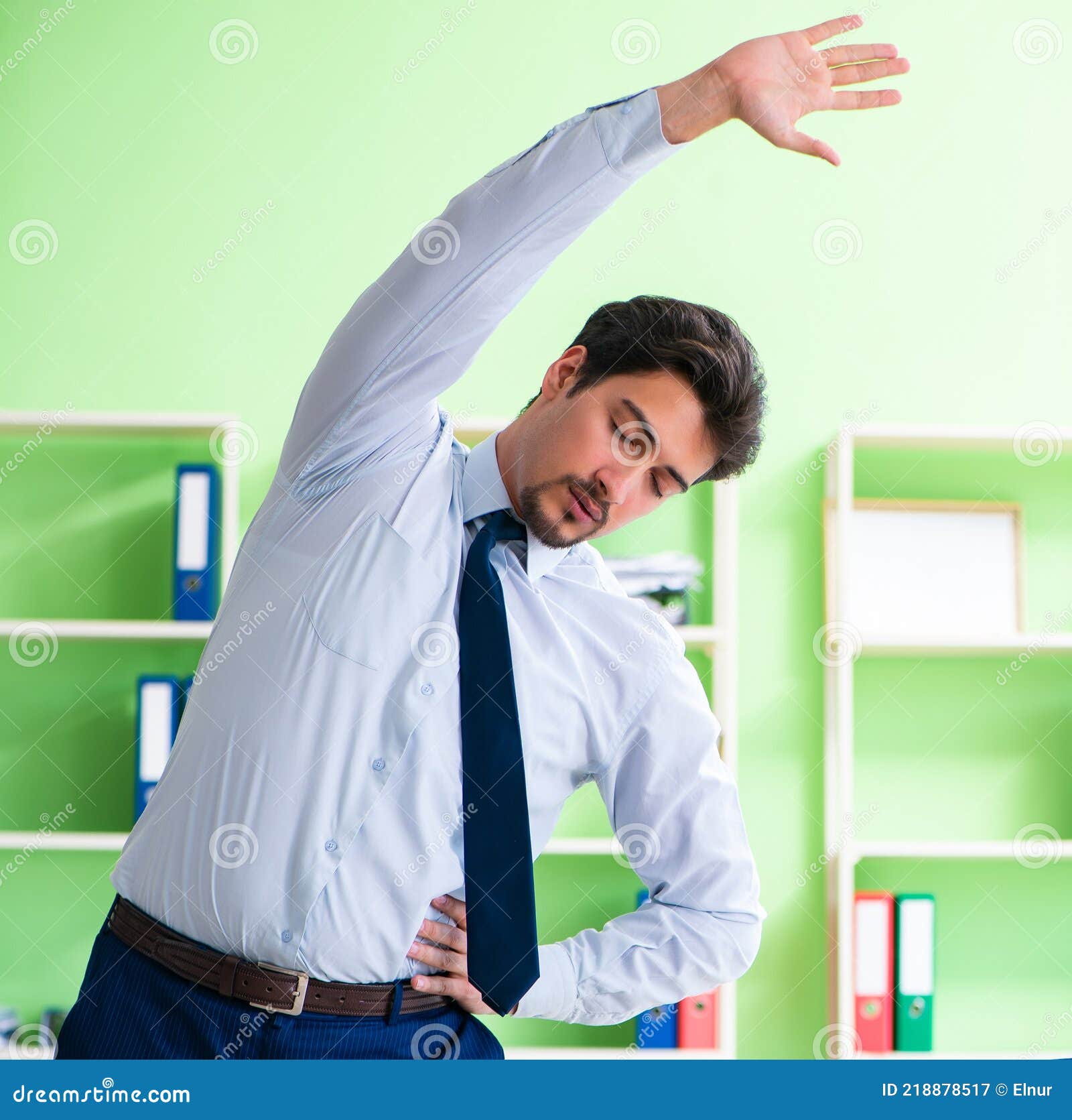 Employee Doing Exercises during Break at Work Stock Image - Image of ...