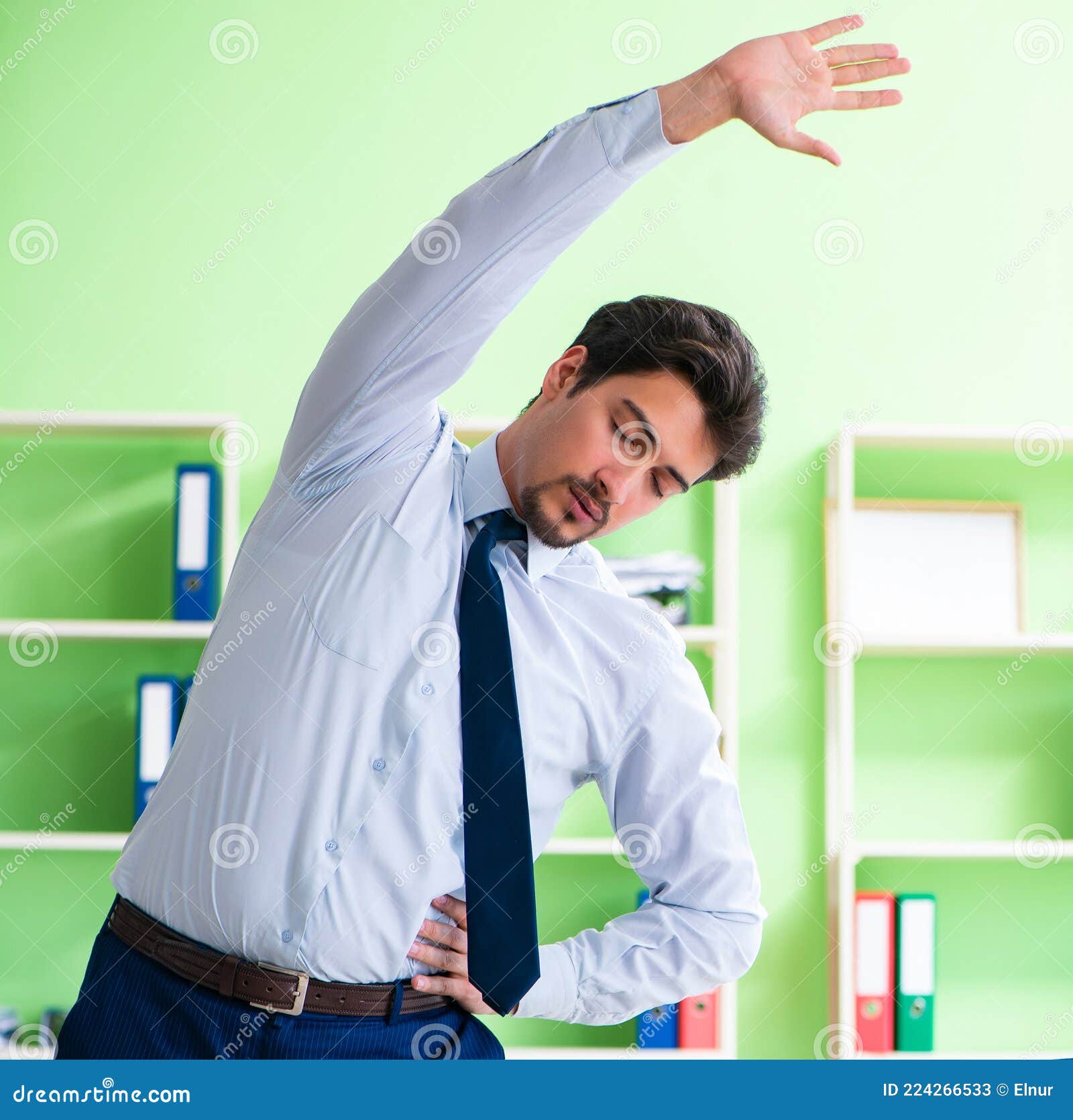Employee Doing Exercises during Break at Work Stock Image - Image of ...