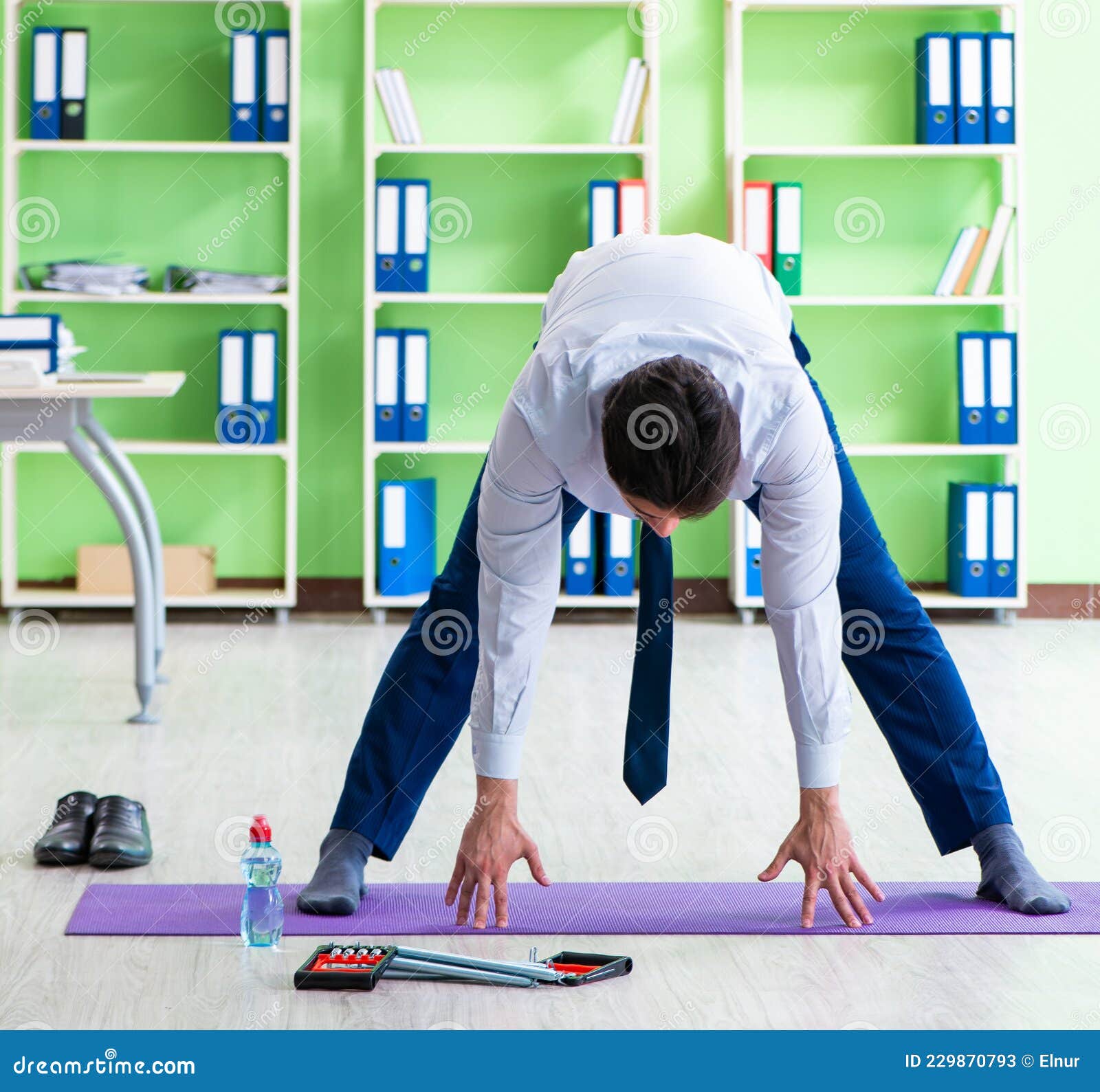 Employee Doing Exercises during Break at Work Stock Image - Image of ...