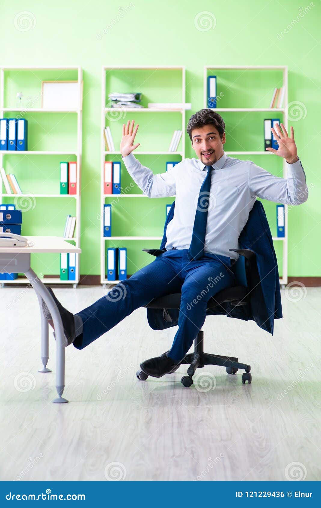 The Employee Doing Exercises during Break at Work Stock Photo - Image ...