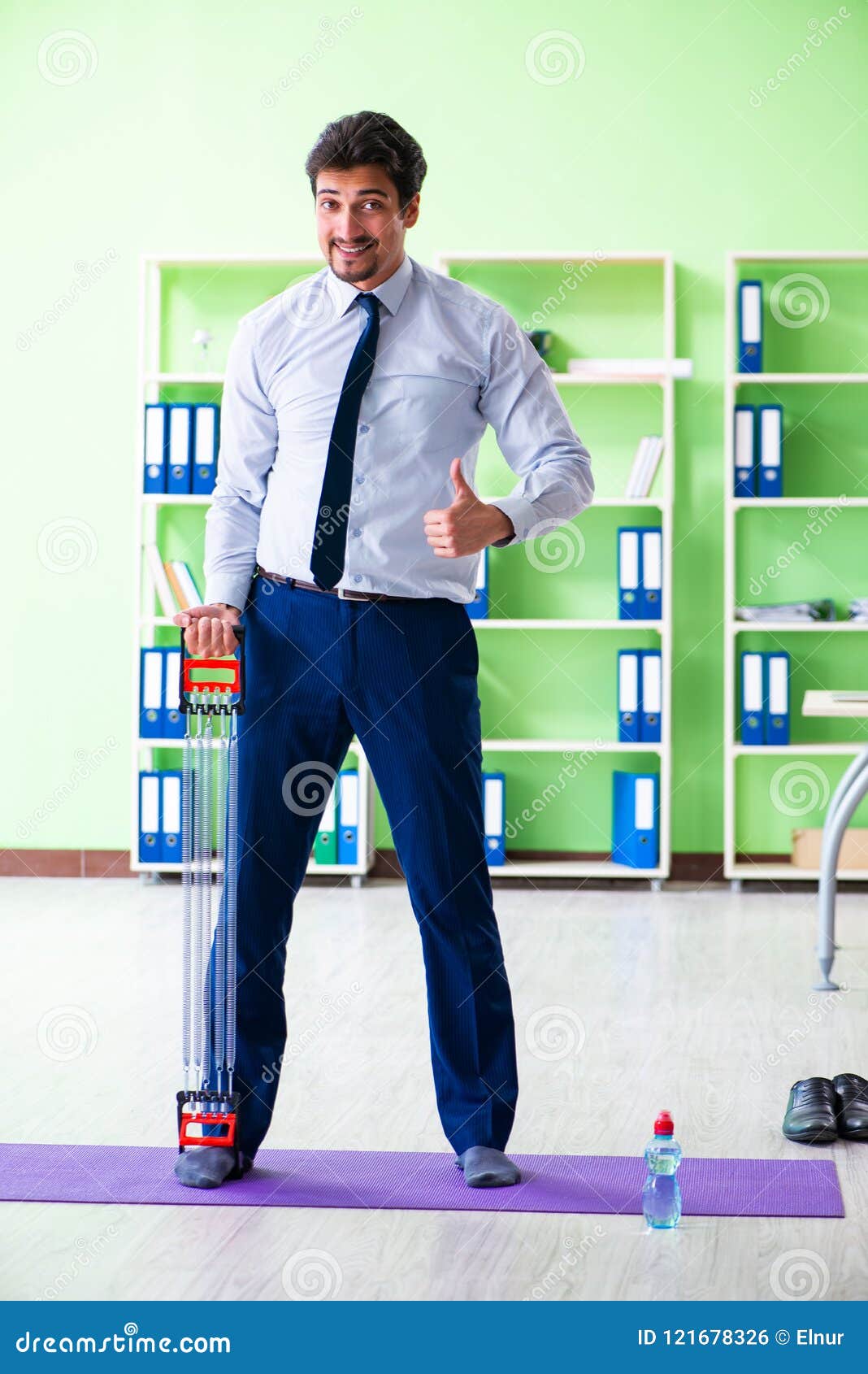 The Employee Doing Exercises during Break at Work Stock Photo - Image ...