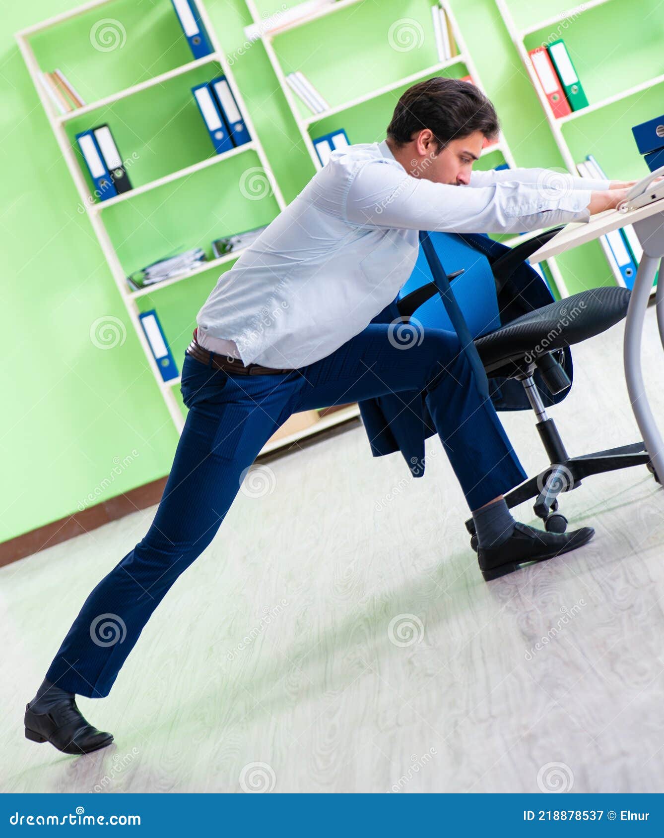 Employee Doing Exercises during Break at Work Stock Image - Image of ...