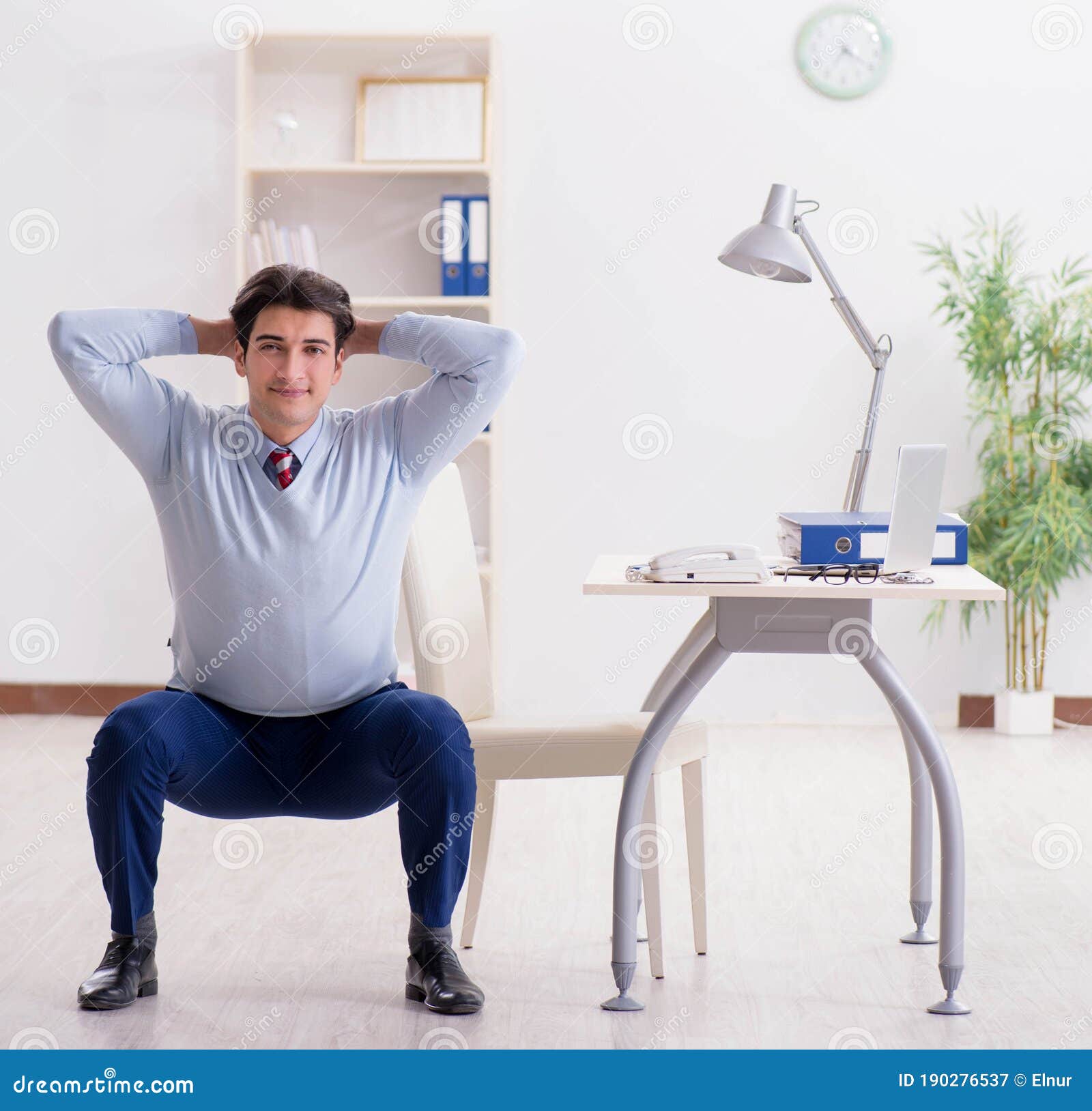 Employee Doing Stretching Exercises in the Office Stock Image - Image ...