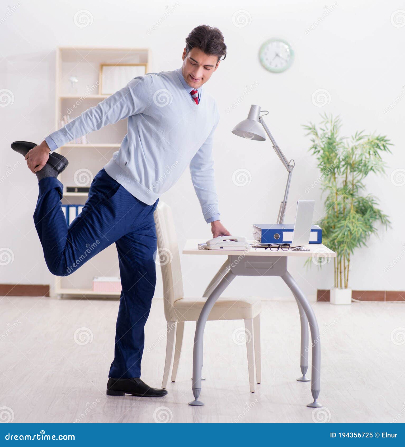 Employee Doing Stretching Exercises in the Office Stock Image - Image ...