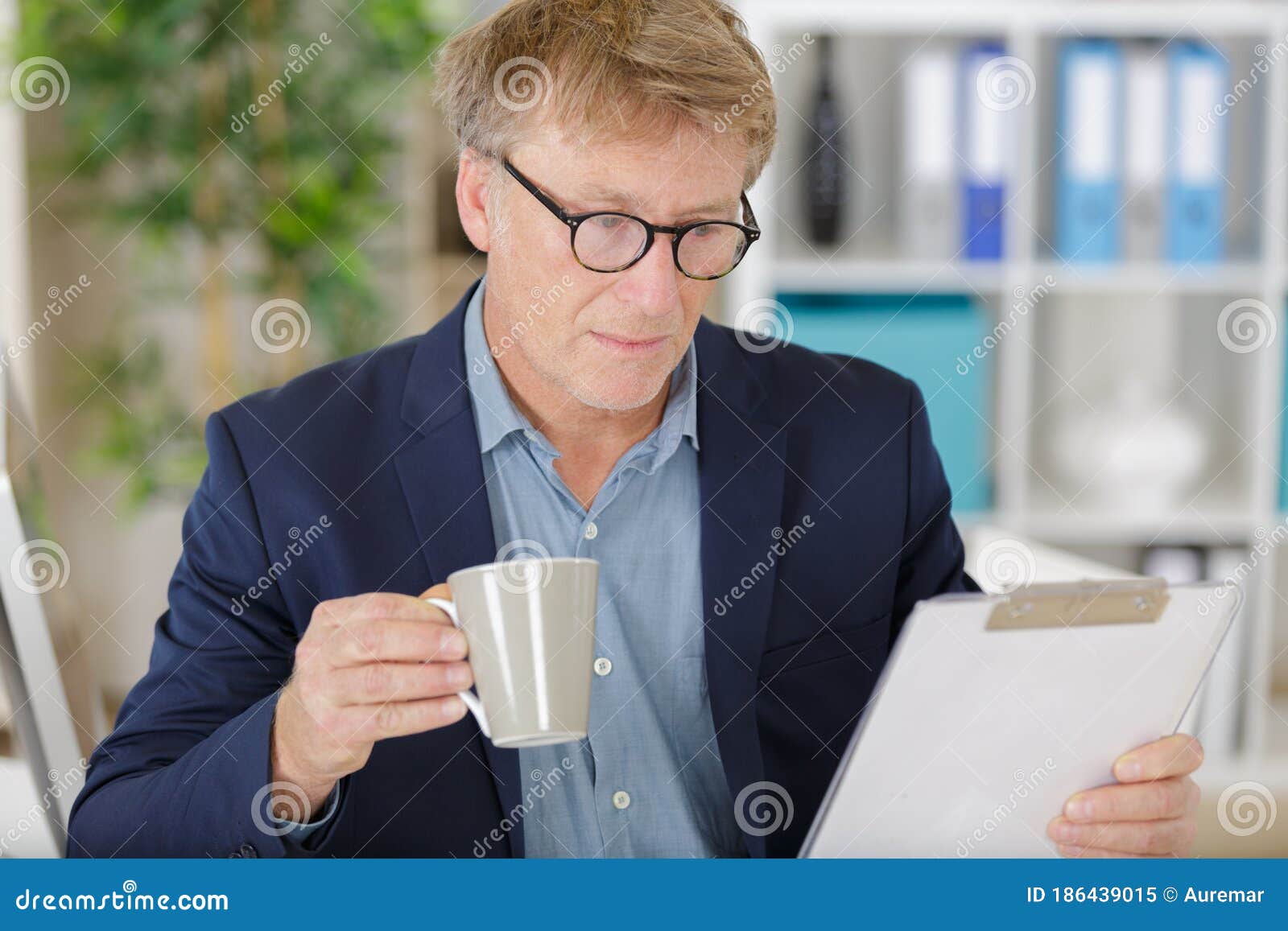 Employee Drinking Coffee in Office Stock Image - Image of male, enjoy ...