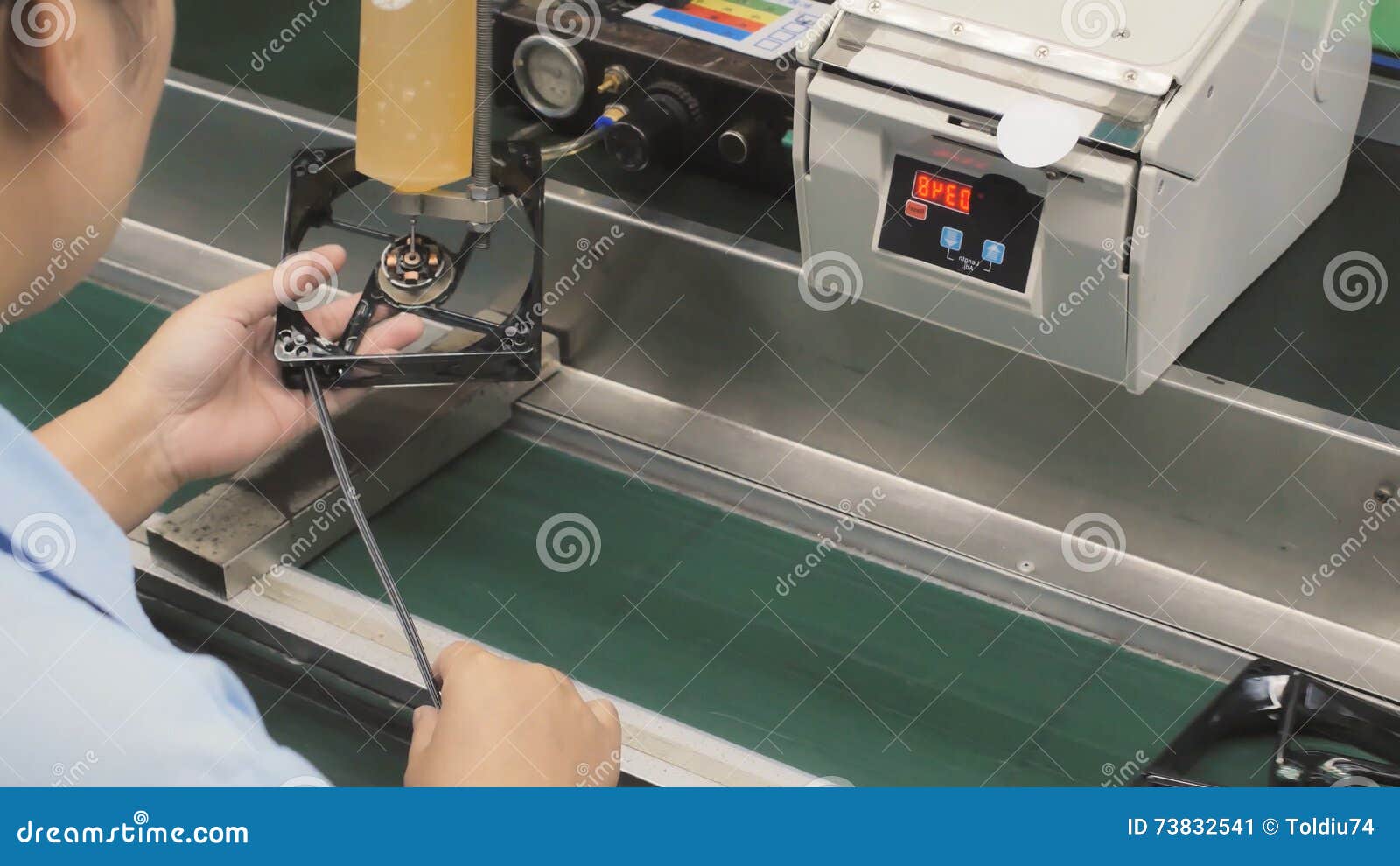 Employee in a Factory of Computer Fans. Stock Image - Image of gloves ...