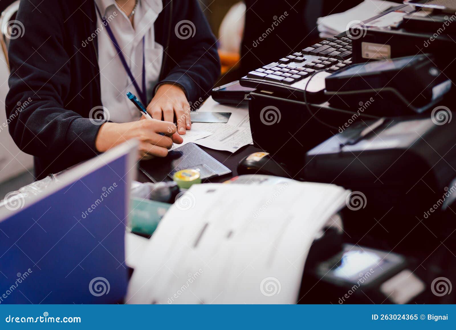 Employee Hand Writing Bank Cheque at Counter. Stock Image - Image of ...