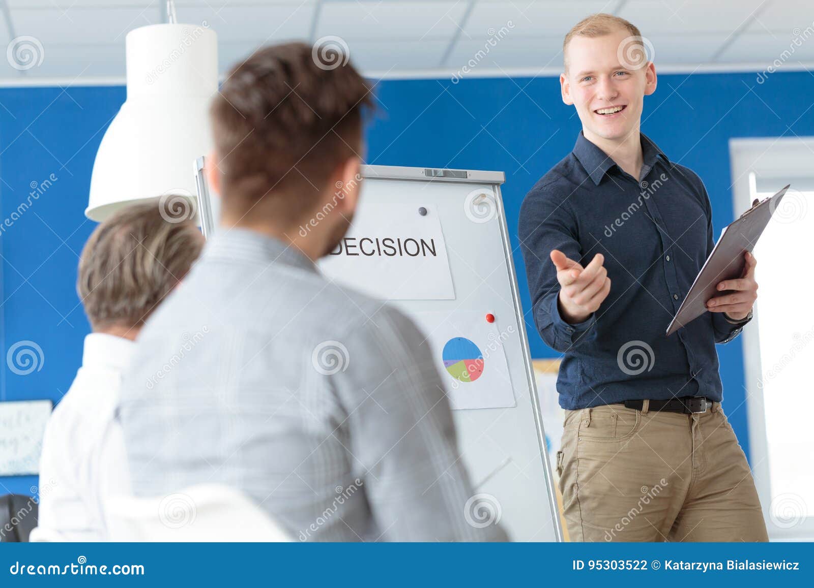 Employee Holding a Questionnaire Stock Photo - Image of modern ...
