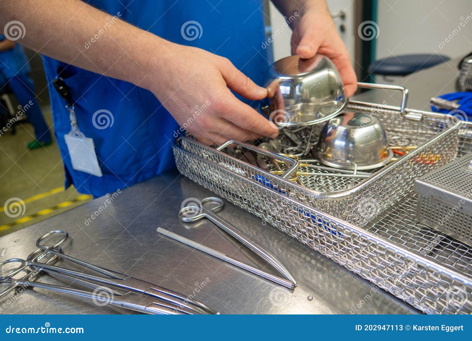 Employee of a Hospital Sterilization Department Sorts the Cleaned ...