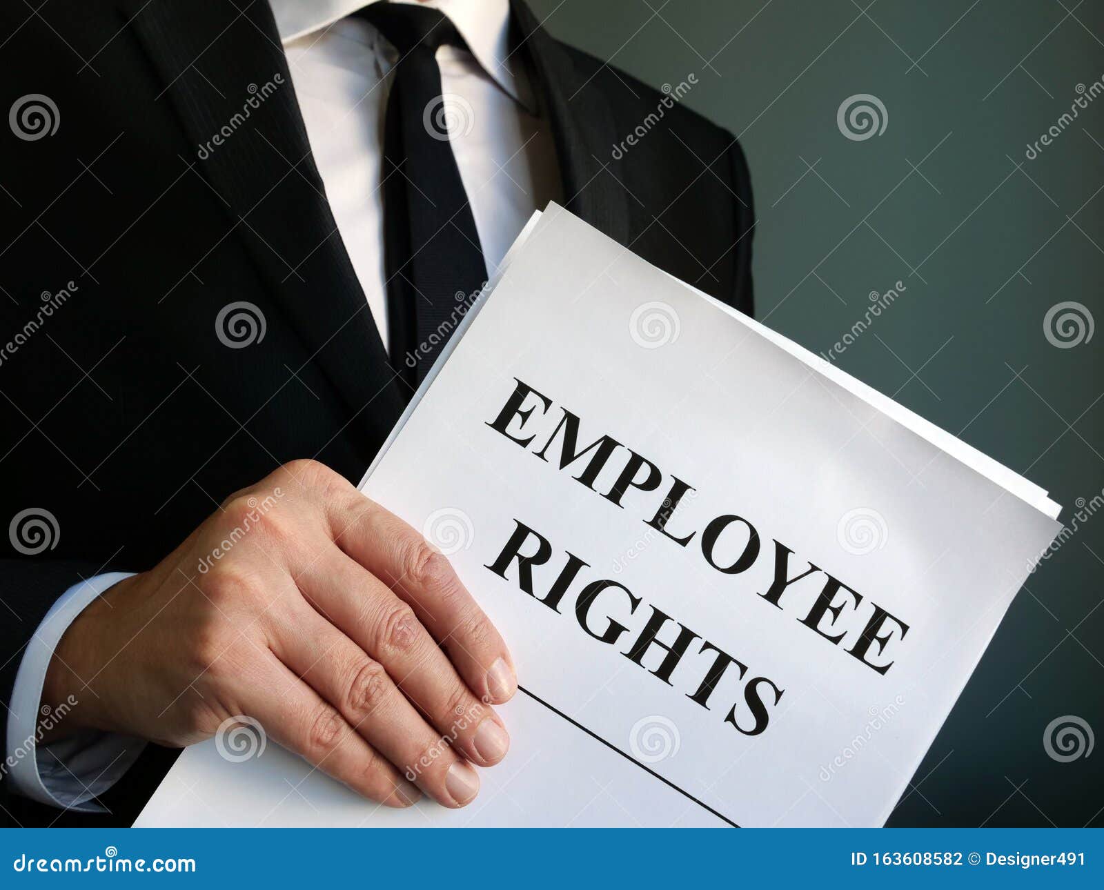 Employee Rights Law Papers in the Hand Stock Photo - Image of ...
