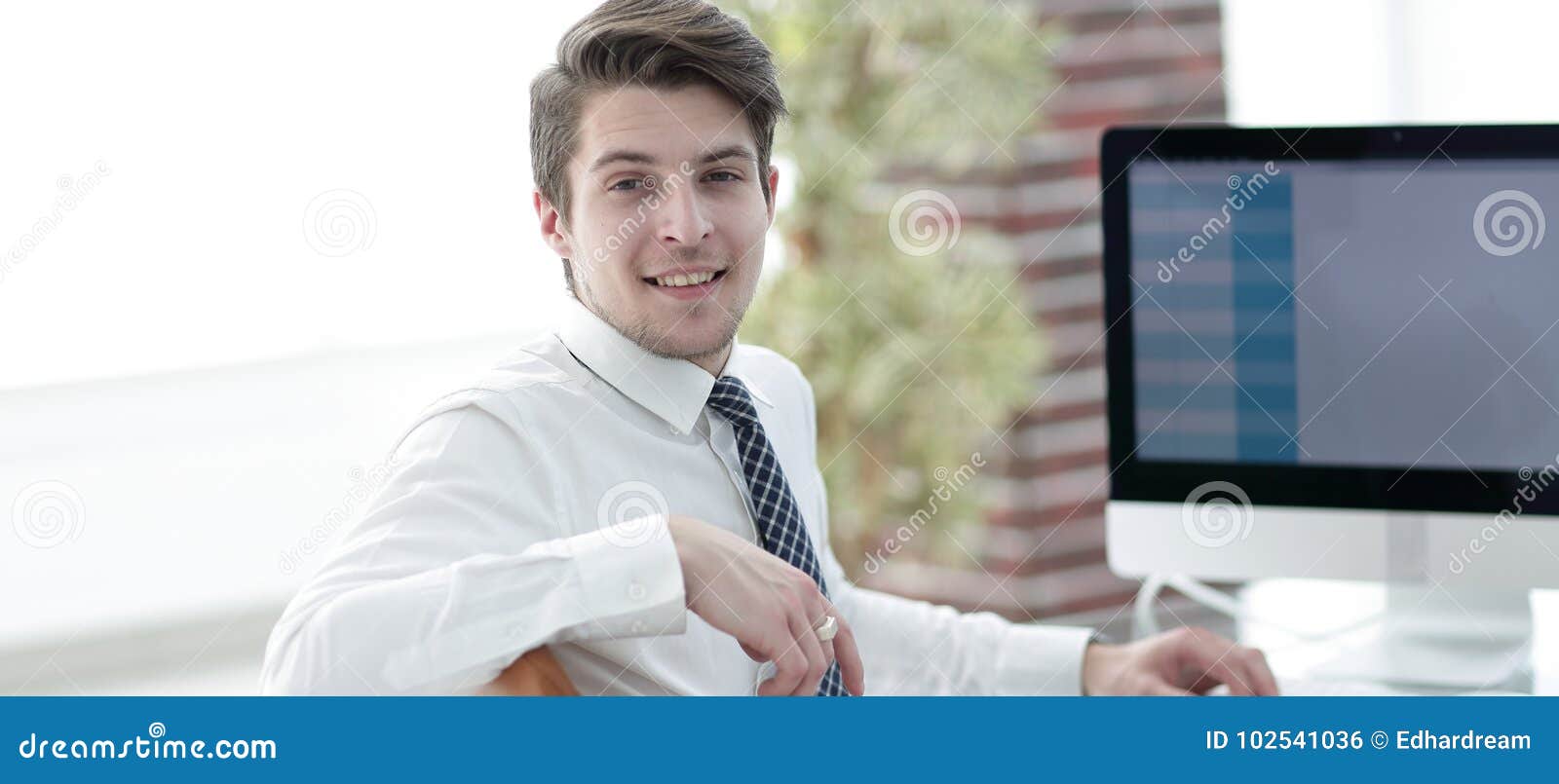Employee Sitting in Front of a Computer Screen Stock Photo - Image of ...