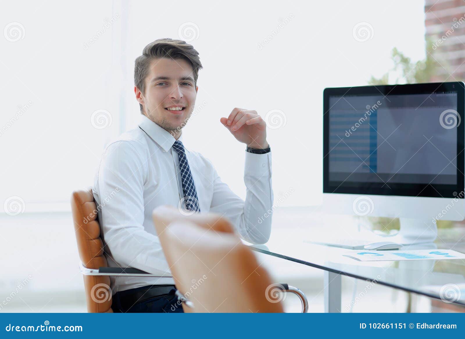 Employee Sitting in Front of a Computer Screen Stock Image - Image of ...