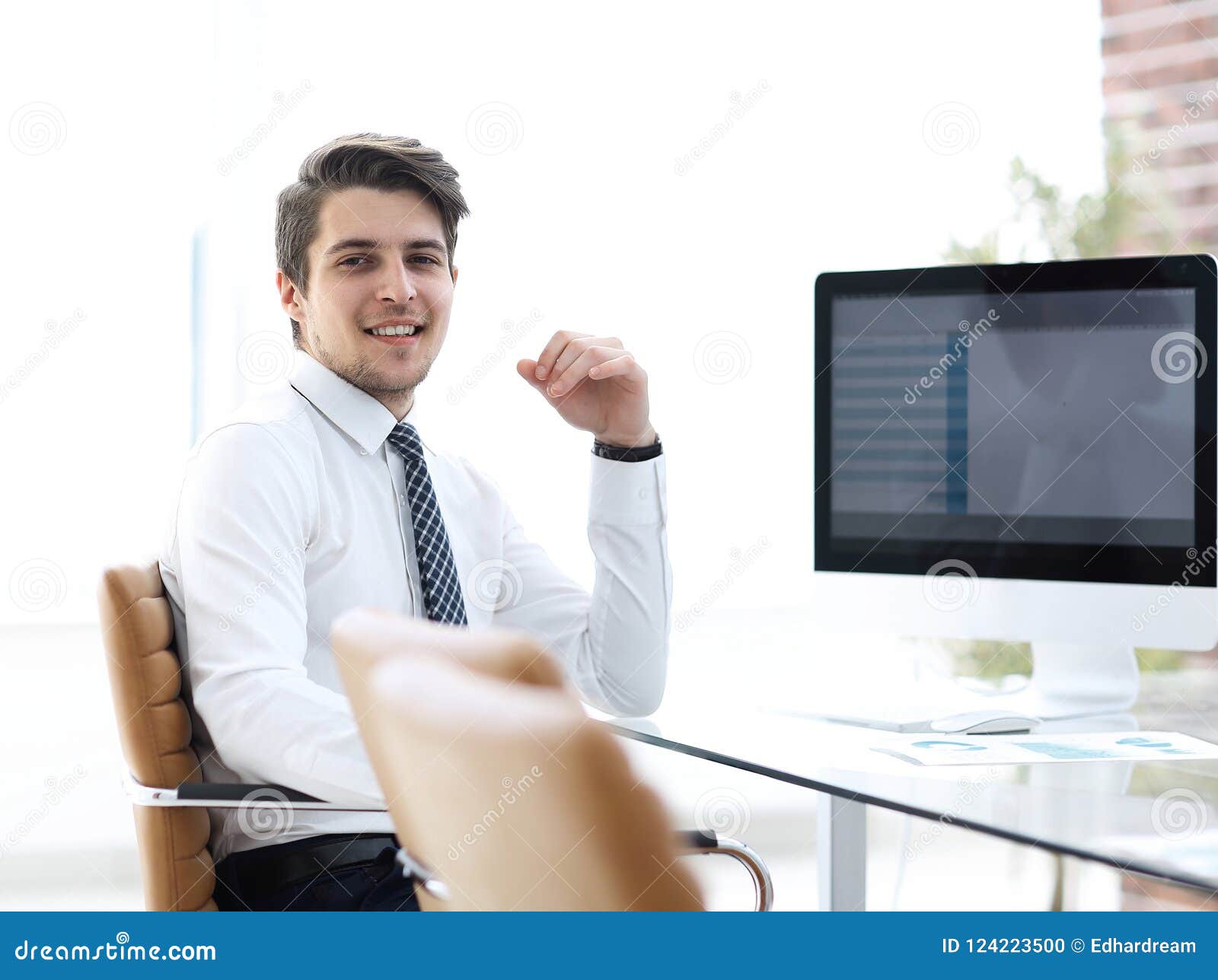 Employee Sitting in Front of a Computer Screen Stock Photo - Image of ...