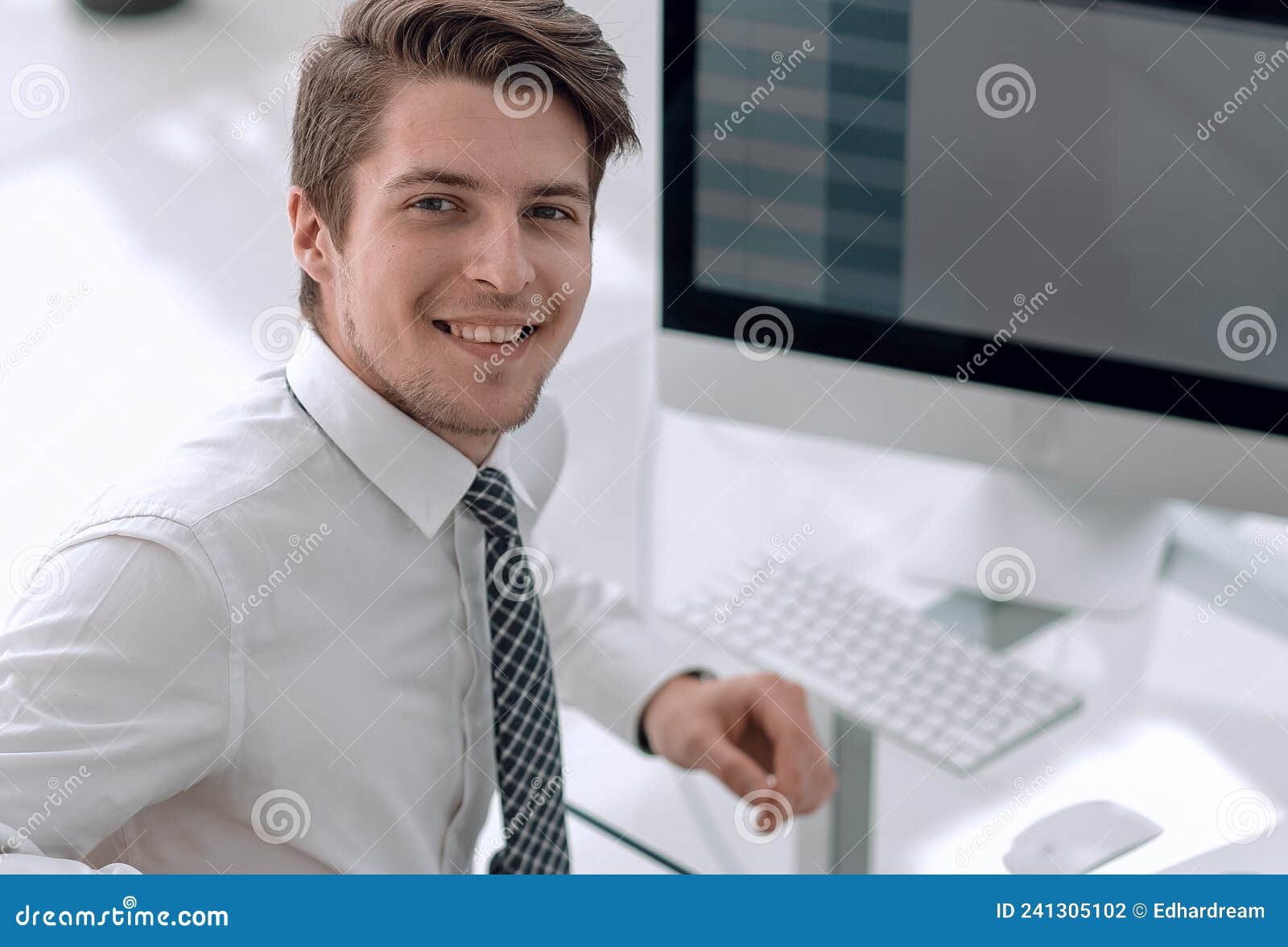 Employee Sitting in Front of a Computer Screen Stock Photo - Image of ...