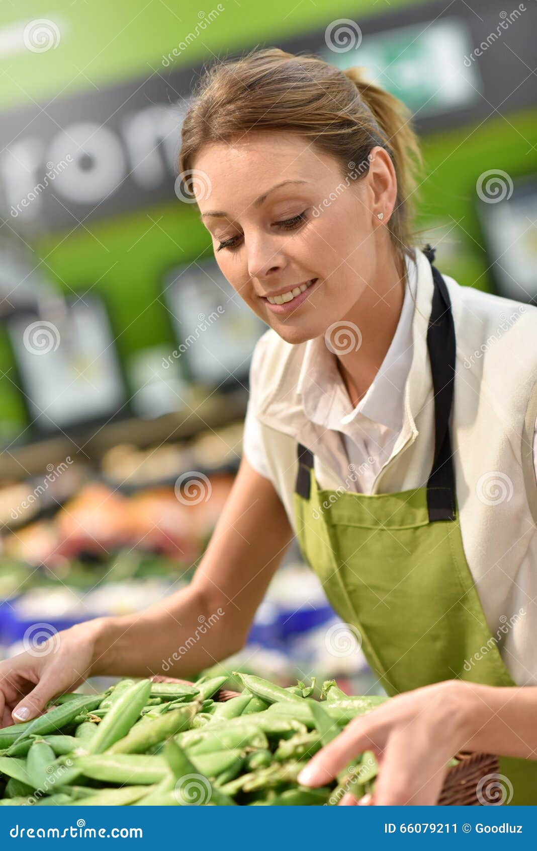Employee in Supermarket Working in Vegetables Section Stock Image ...