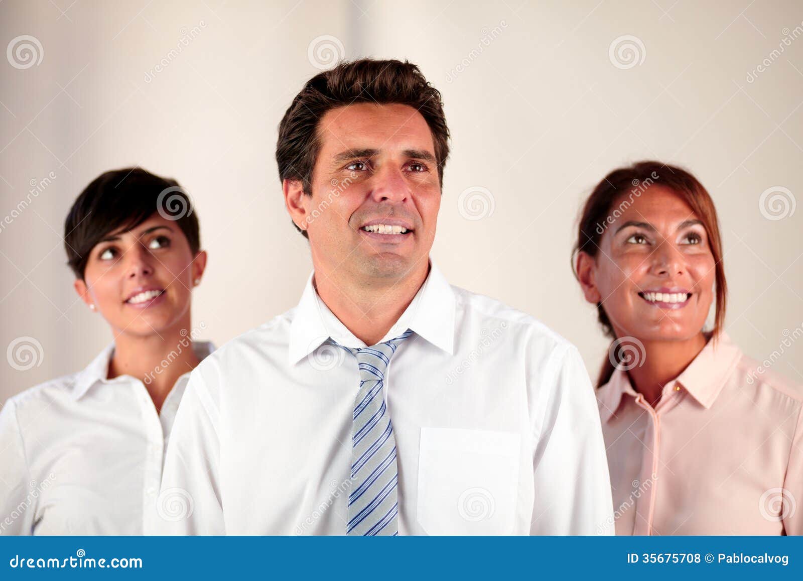 Employee Team Smiling and Looking at People Stock Photo - Image of ...