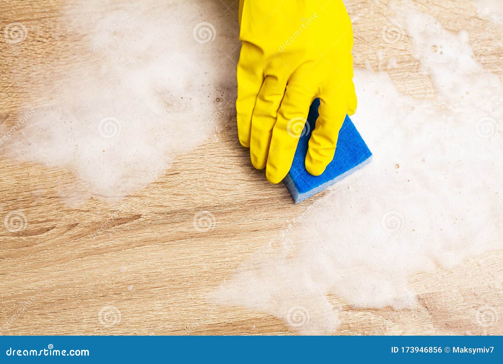 Employee Using Sponge for Cleaning Wood Table Stock Photo - Image of ...