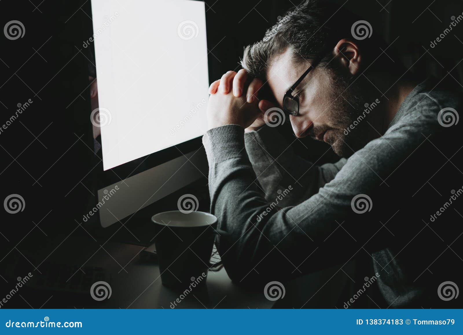 Employee Working at the Computer Late at Night in the Office Stock ...