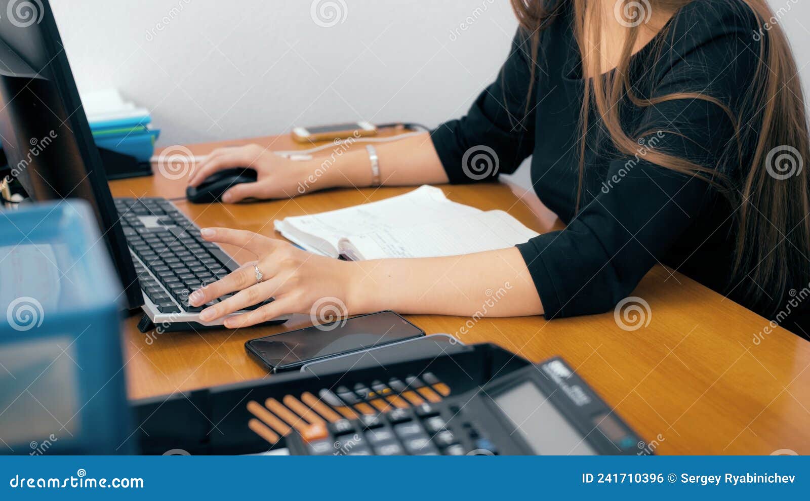 Employee Working on Computer in Office. Scrolling through a ...