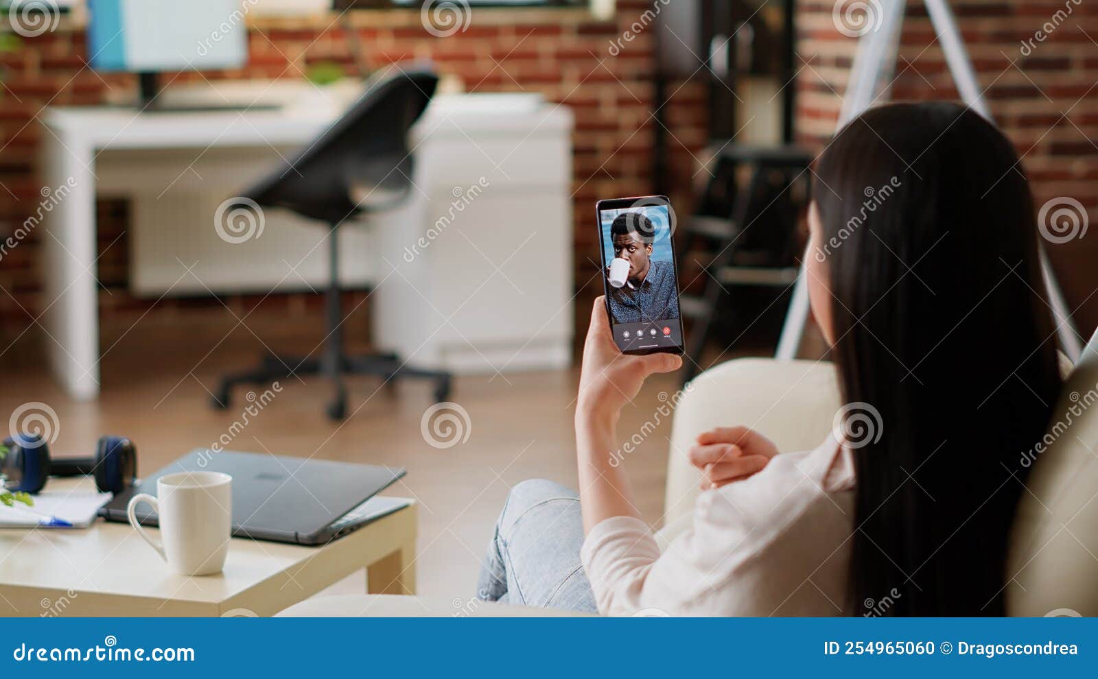 Employee Working Remotely from Home while Using Talking with Coworker ...