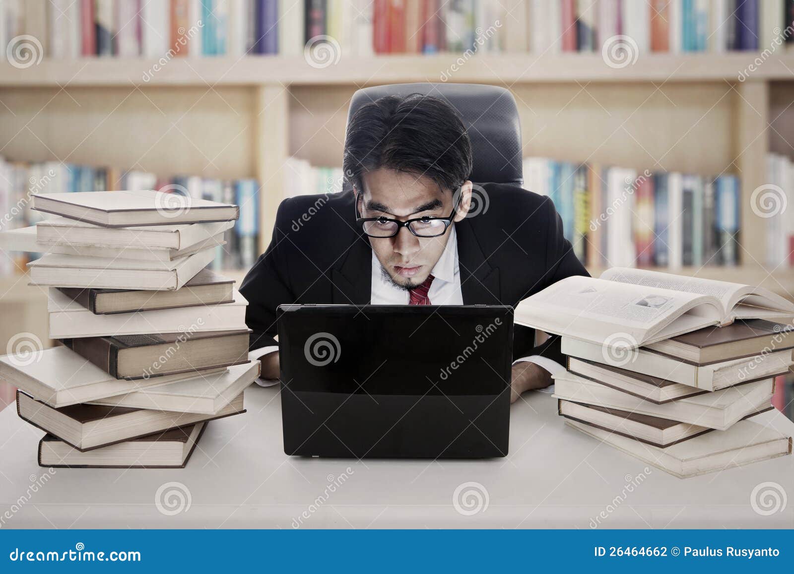 Employee works in library stock photo. Image of library - 26464662