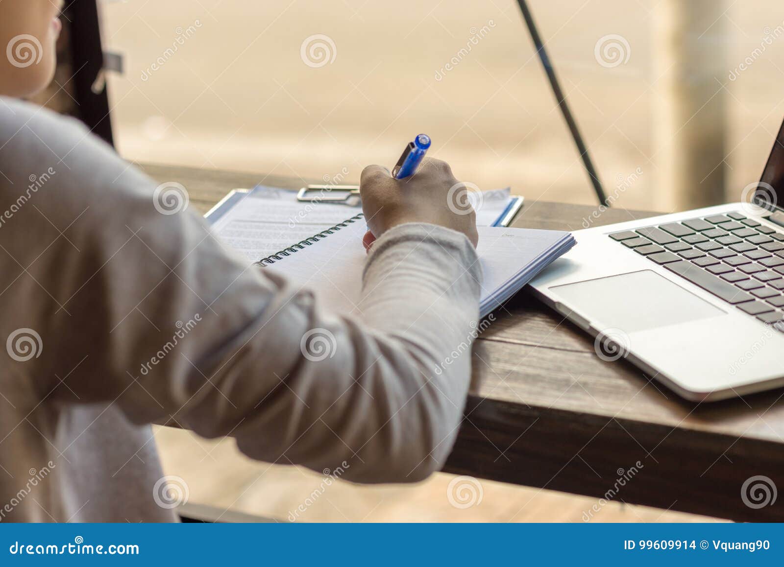 Employee Writing Information from Reports To Notebook Stock Photo ...