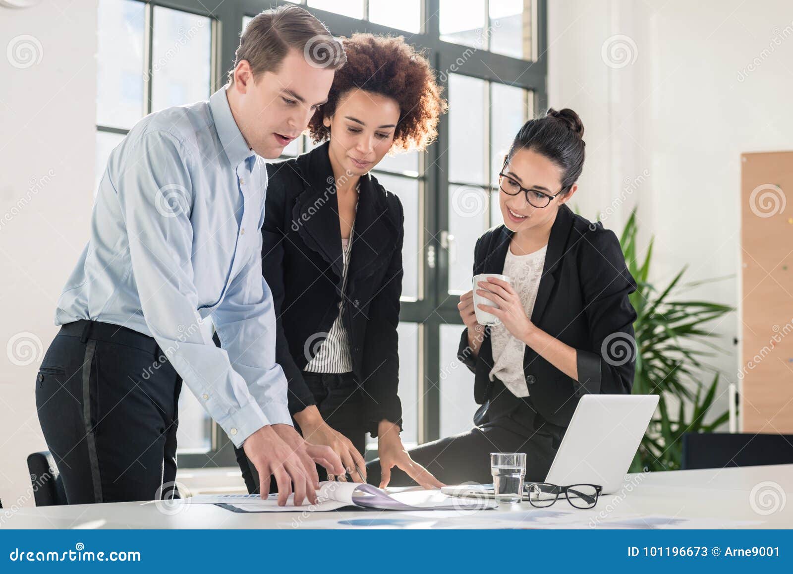 Employees Checking Together Documents and Business Reports Stock Image ...