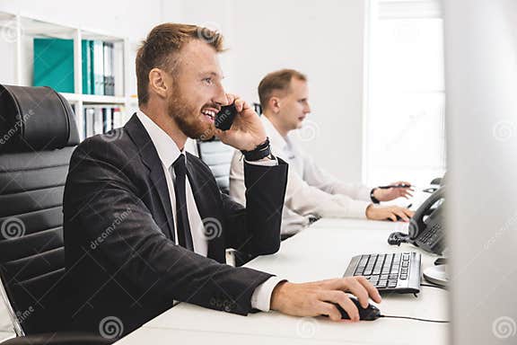 Employees of the Company Work at Computers in the Office. Interaction ...