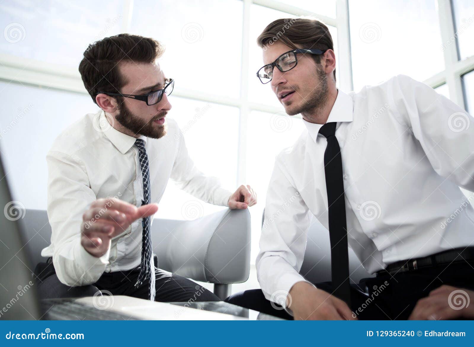 Employees Discussing New Ideas. Stock Photo - Image of businessmen ... Employees Discussing New Ideas. Stock Photo - Image of businessmen ...