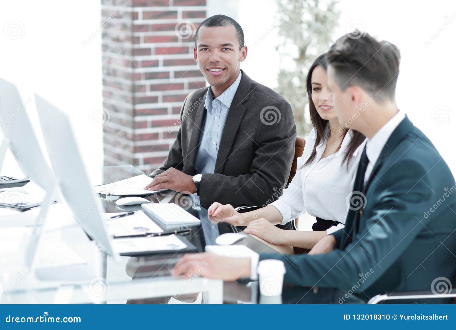 Employees Discussing New Ideas in the Workplace in the Office. Stock ...