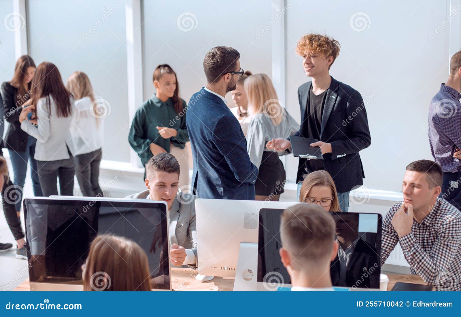 Employees Discussing Work Issues in the Office Stock Photo - Image of ...