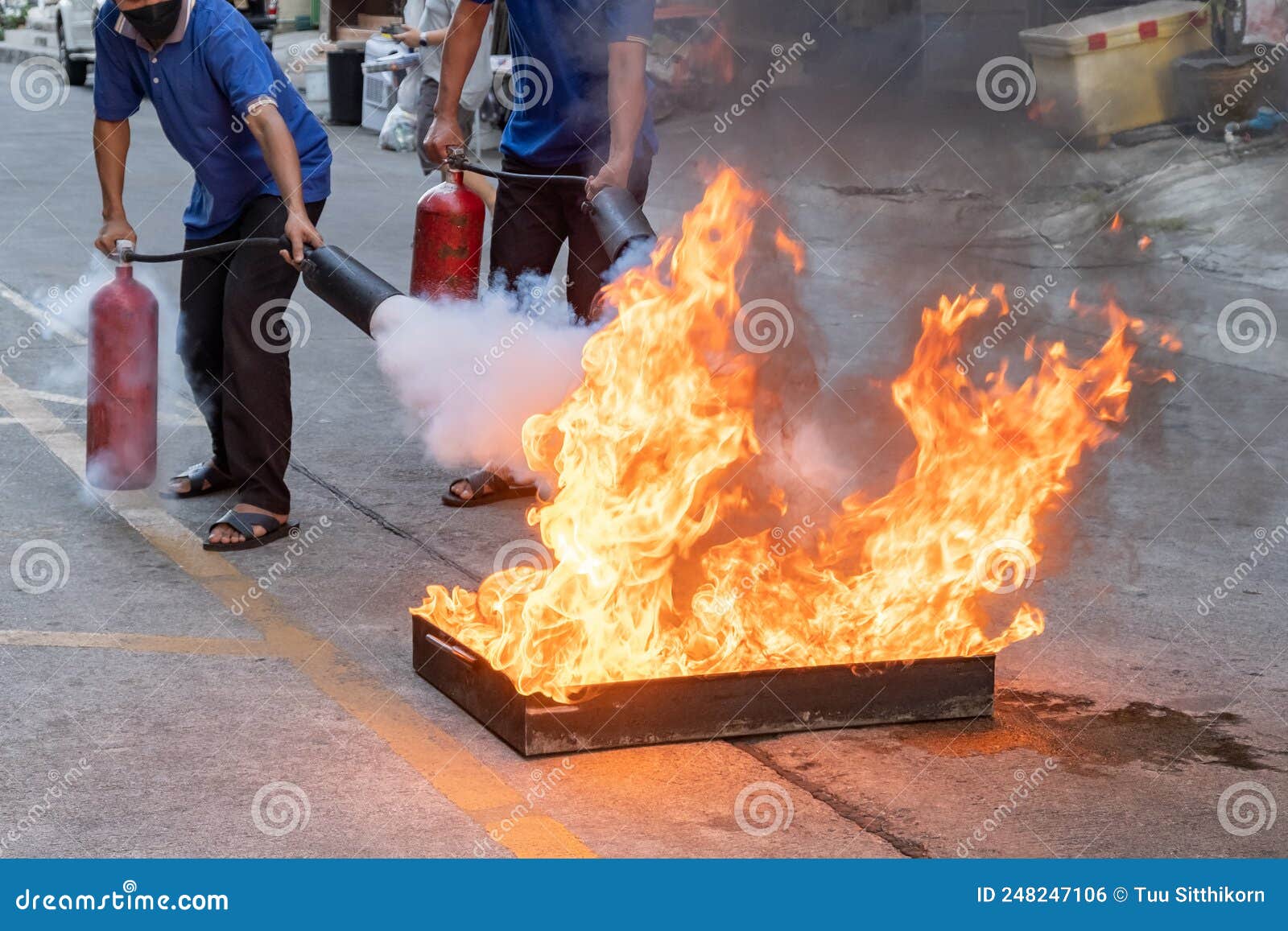Employees Firefighting Training,Extinguish a Fire Stock Photo - Image ...
