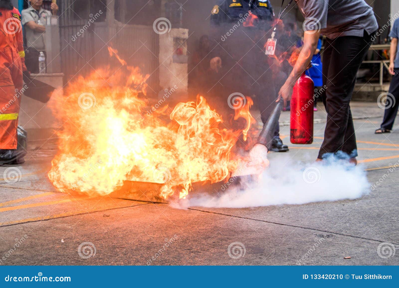 Employees Firefighting Training,Extinguish a Fire Stock Photo - Image ...