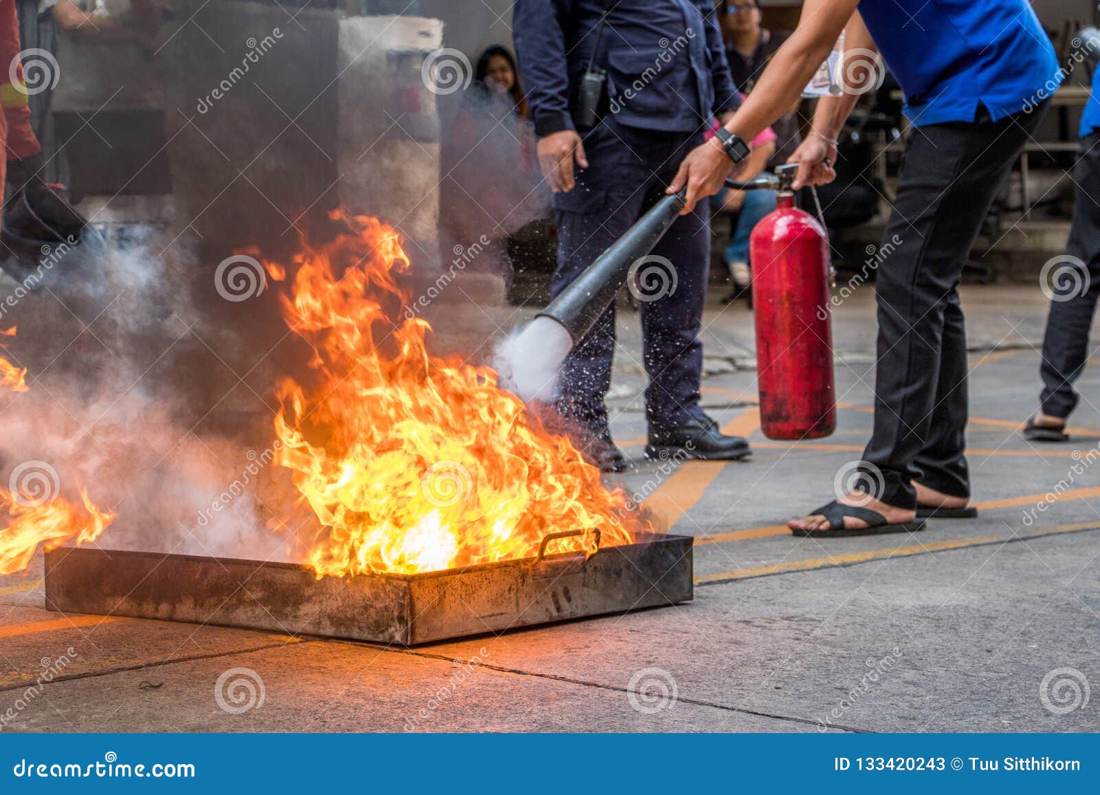 Employees Firefighting Training,Extinguish a Fire Stock Image - Image ...