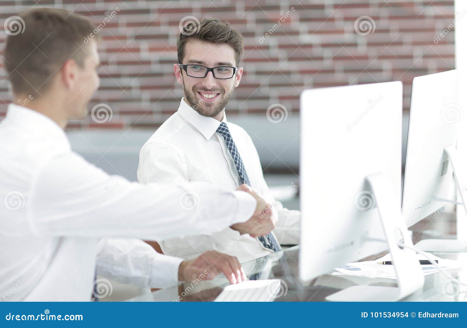 Handshake of the Employees at the Desk Stock Photo - Image of ...