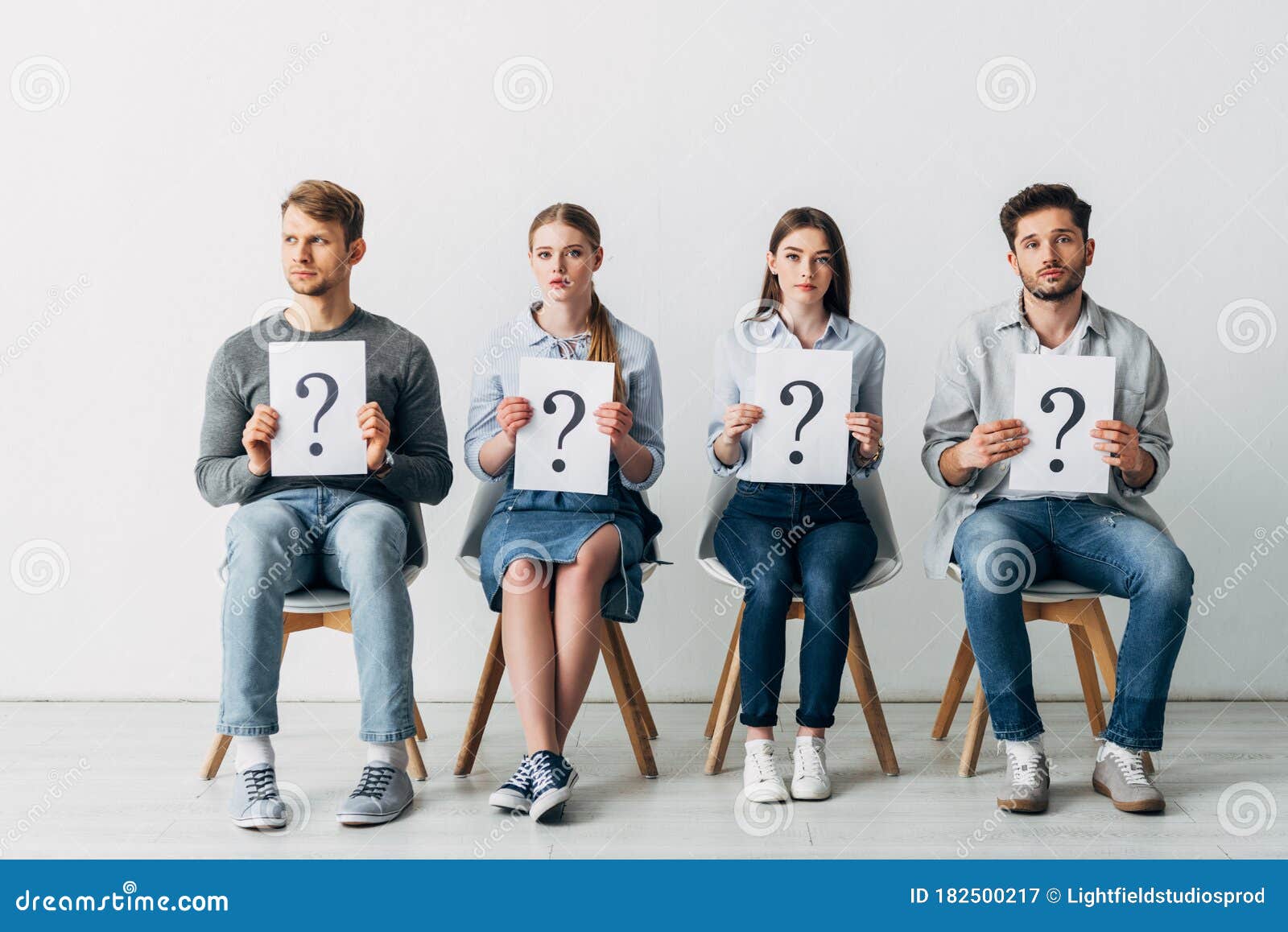 Employees Holding Cards with Question Marks while Waiting for Job ...