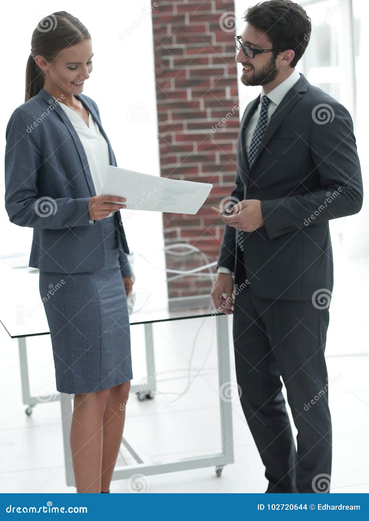 Employees Discuss Important Documents Stock Photo - Image of leaders ...