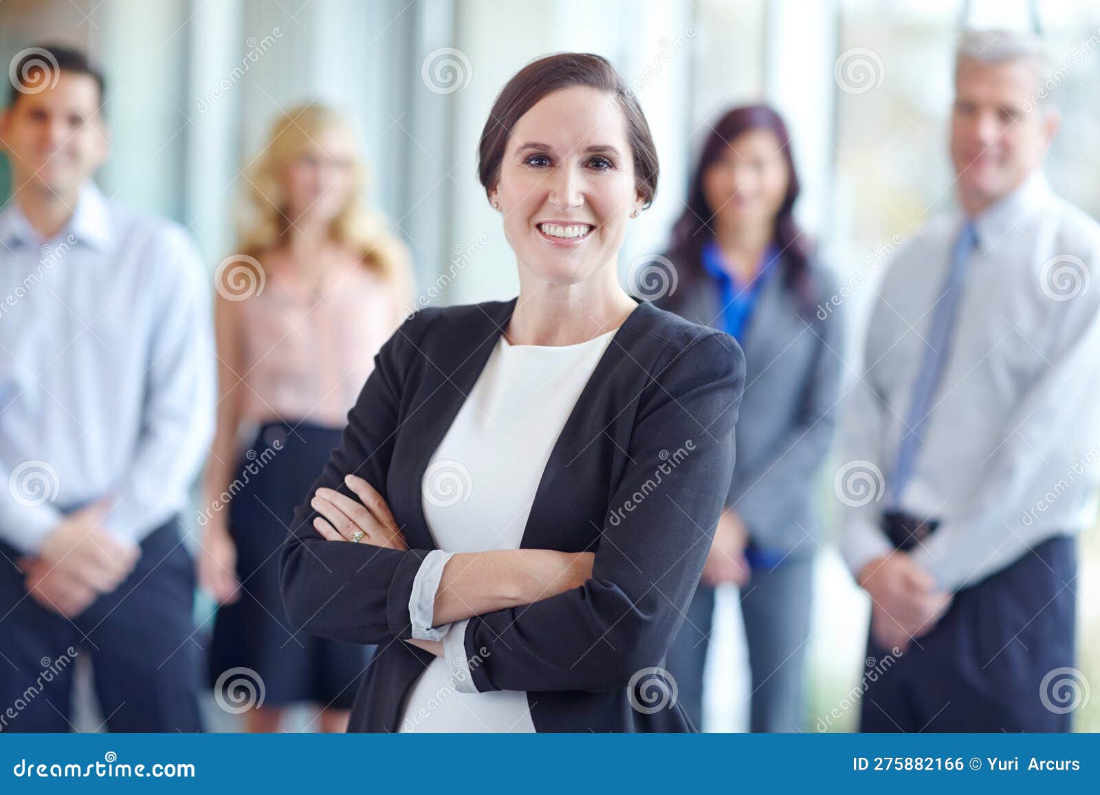 Employees Prosper Under Her Management. a Group of Executives Standing ...