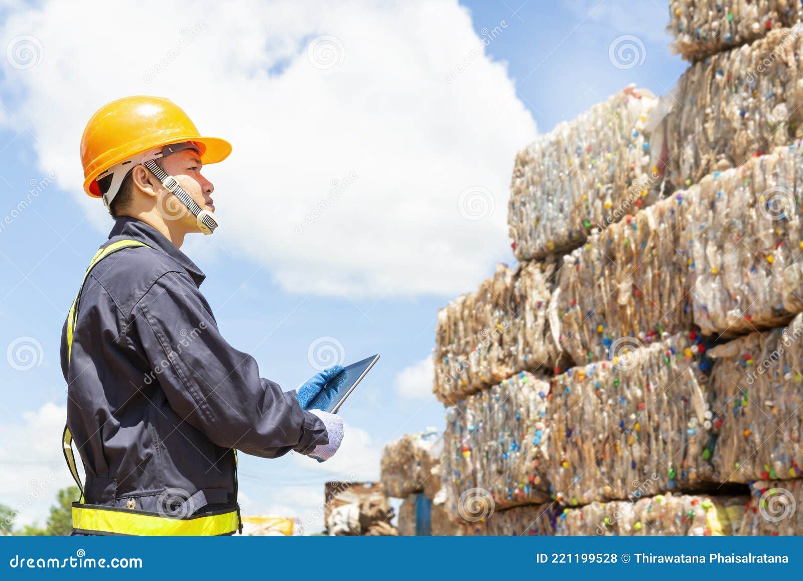 Employees in a Recycling Plant Inspecting the Raw Materials in the ...
