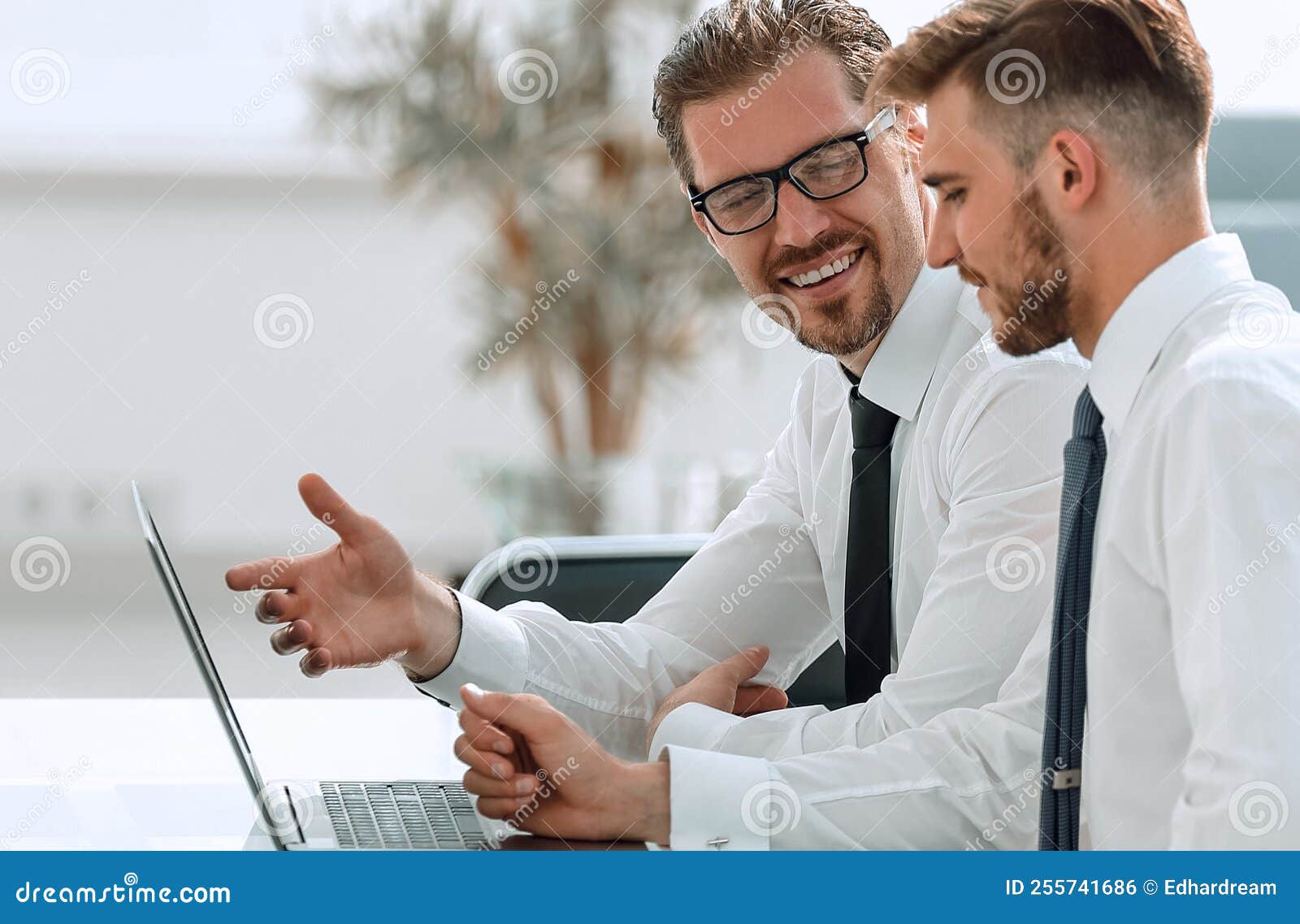 Employees Sitting at a Desk in a Modern Office Stock Photo - Image of ...