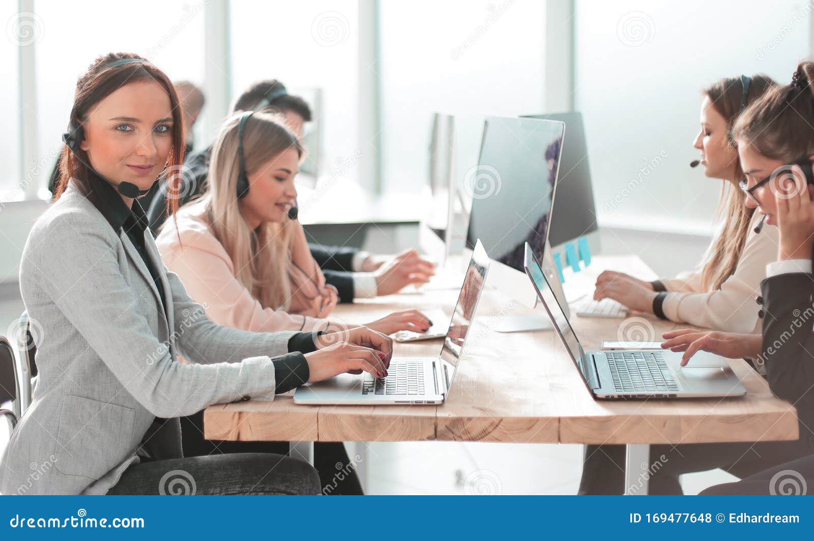 Employees of the Support Center at the Workplace in the Office Stock ...