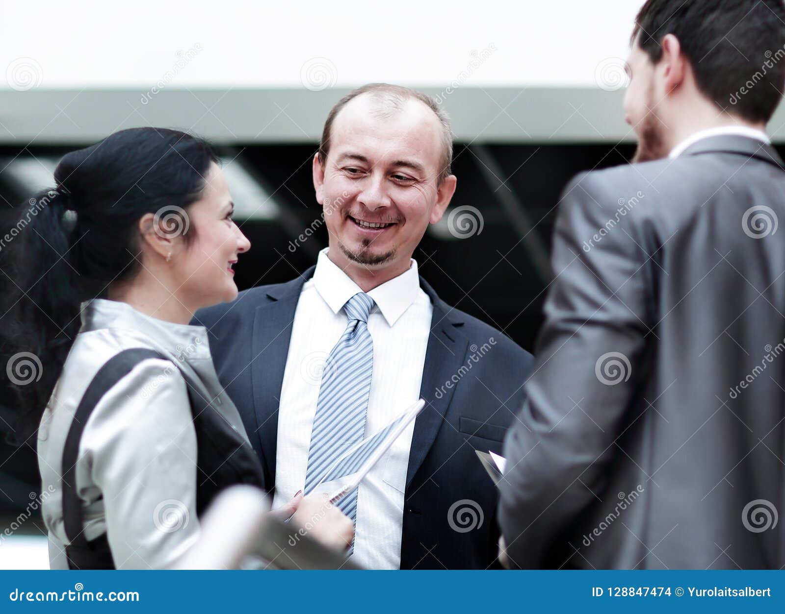Employees are Talking in the Lobby of the Office Stock Photo - Image of ...