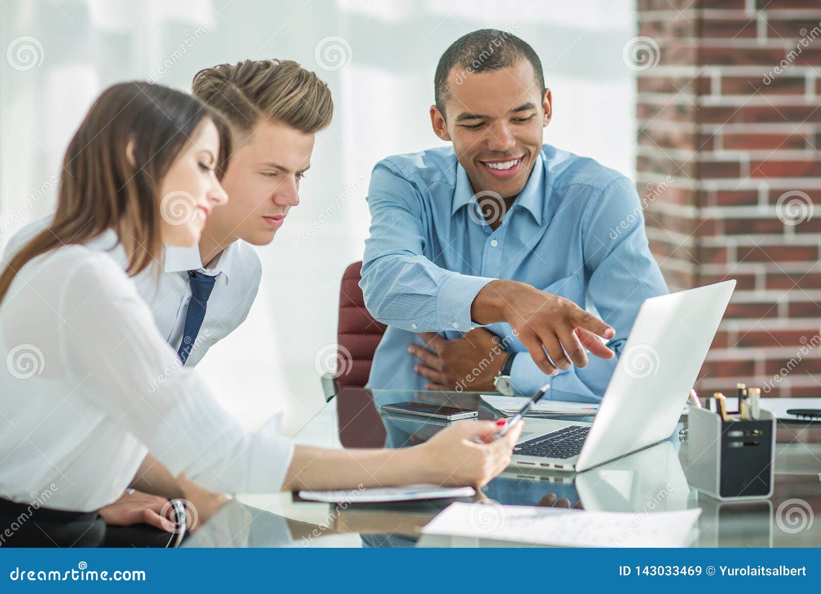 Employees Talking To a Customer Sitting at the Desk Stock Image - Image ...