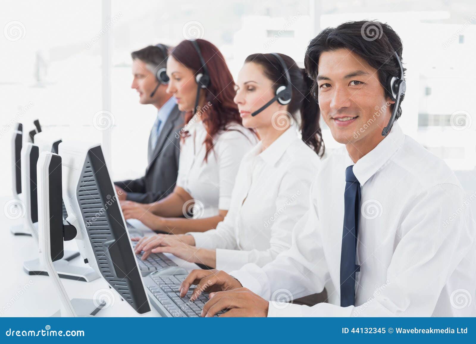 Employees Typing on Their Computers Stock Image - Image of businessman ...
