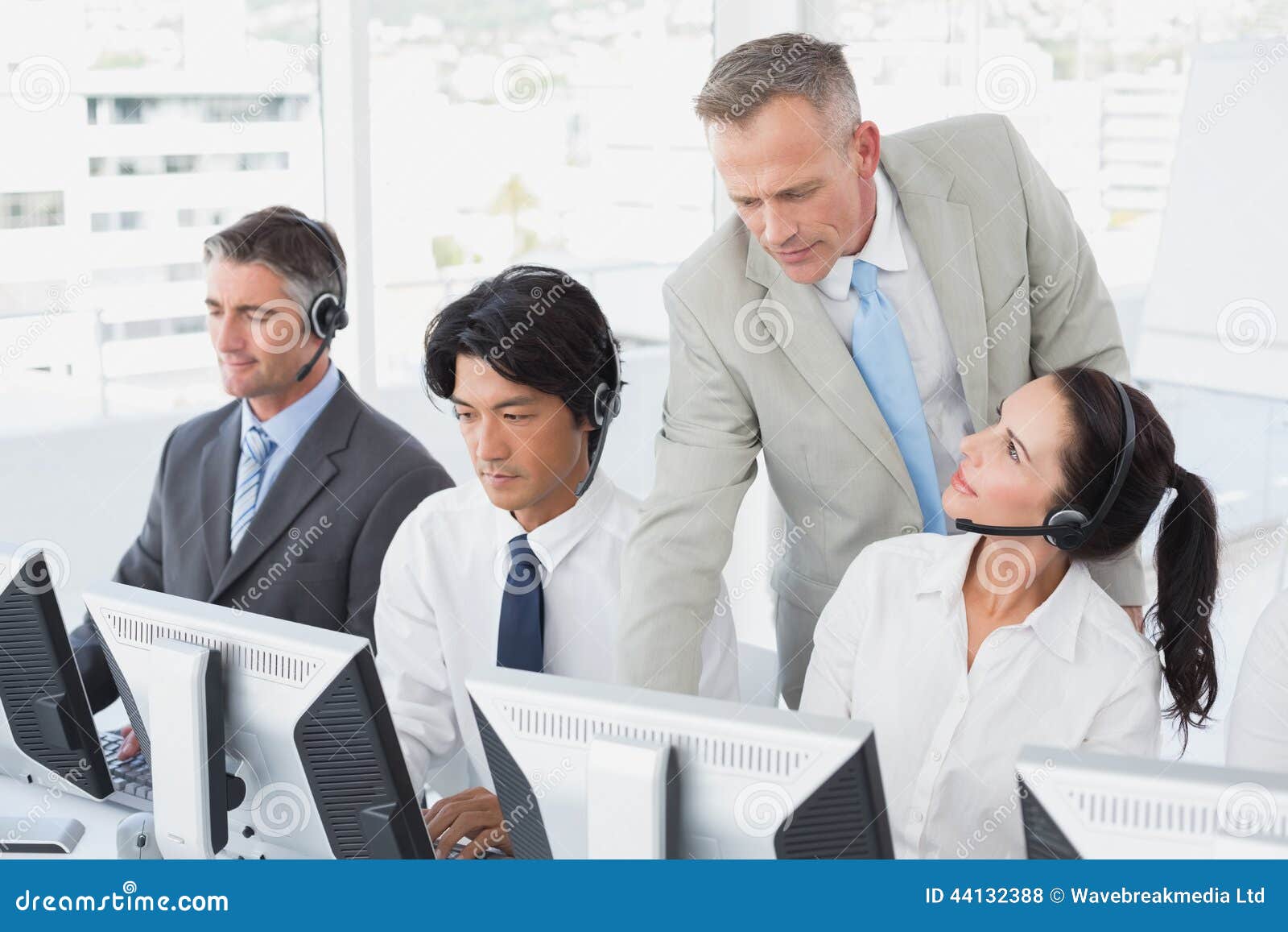 Employees Typing on Their Computers Stock Photo - Image of four, adult ...