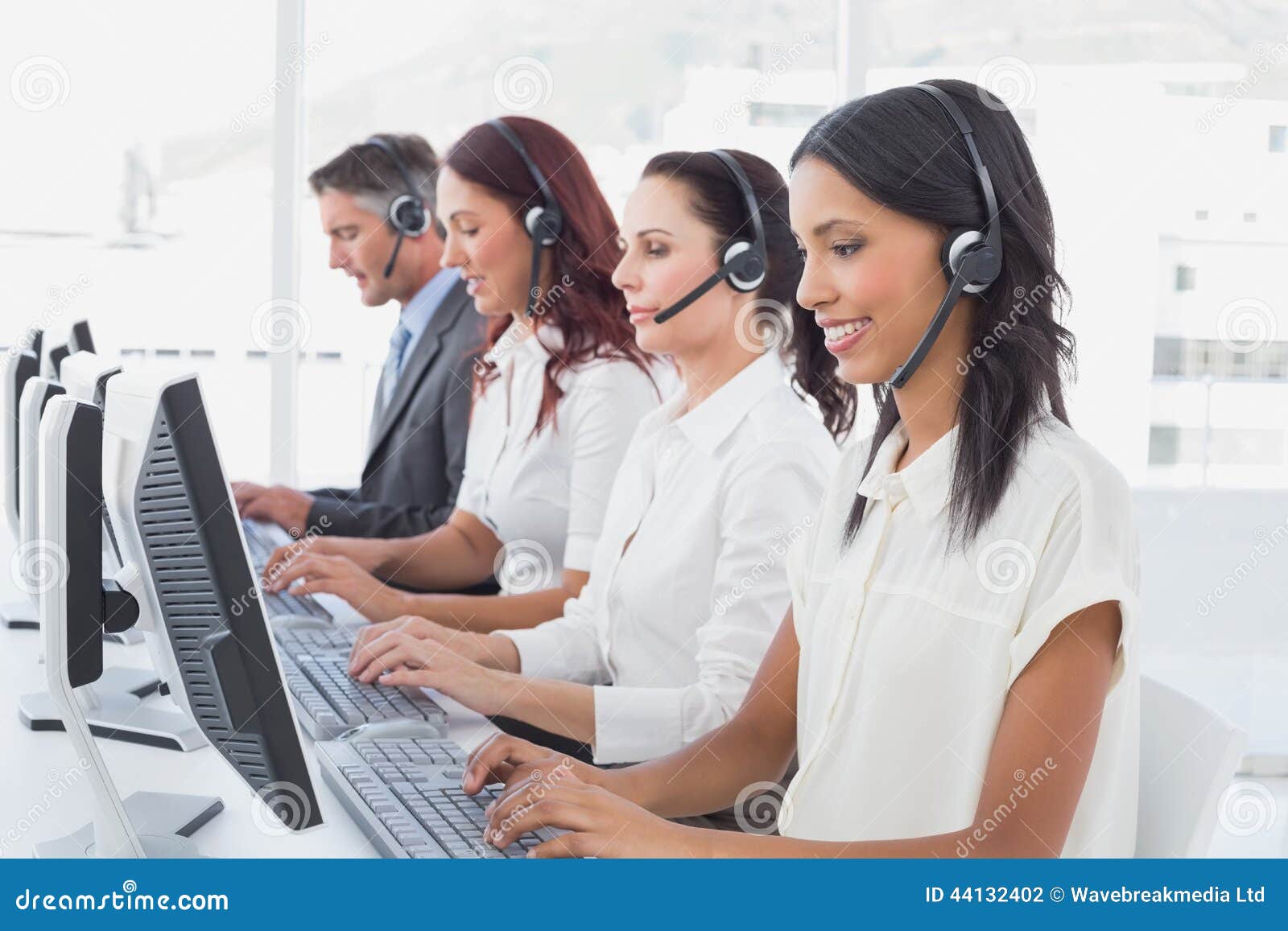 Employees Typing on Their Computers Stock Photo - Image of colleagues ...