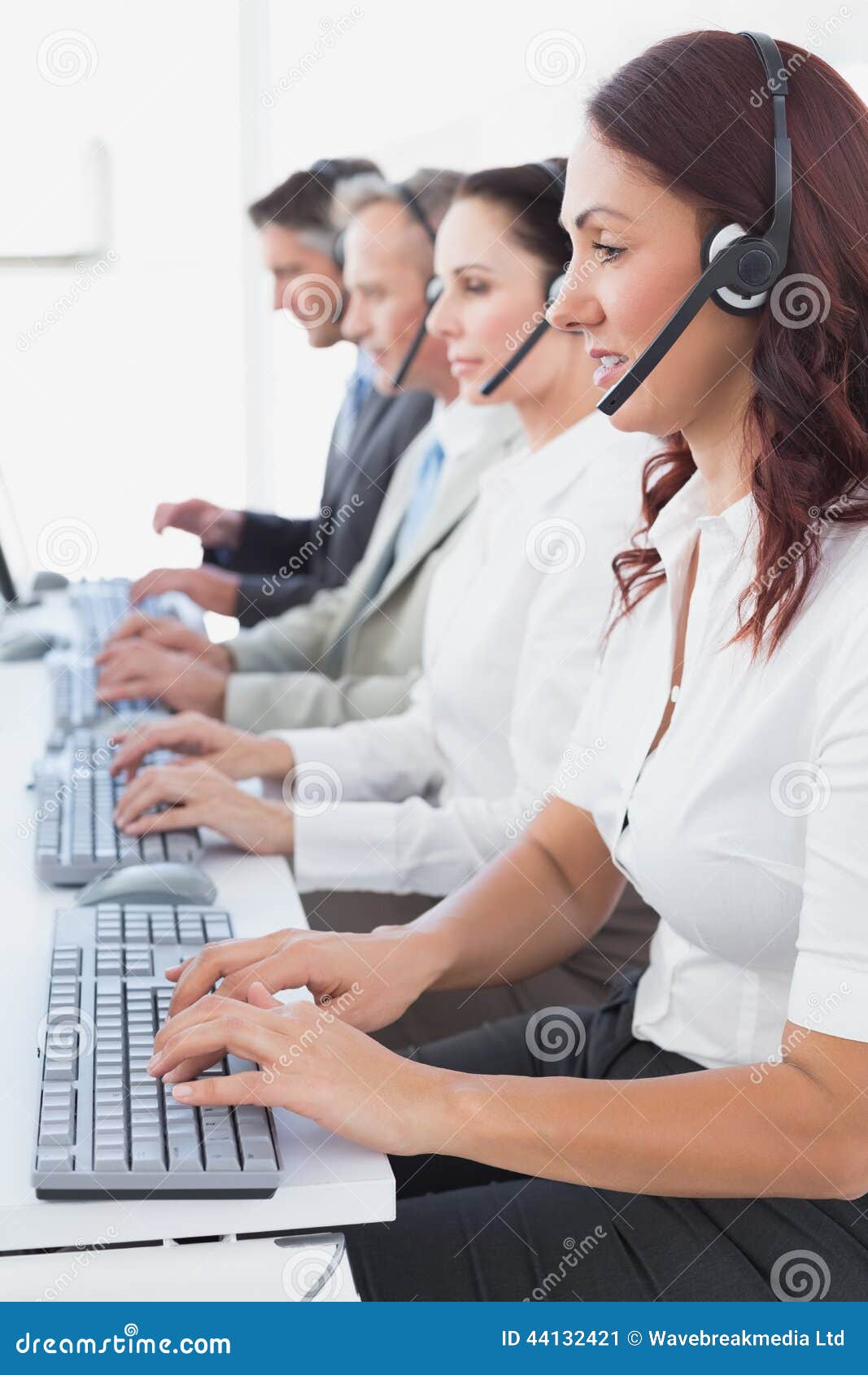 Employees Typing on Their Computers Stock Image - Image of colleagues ...